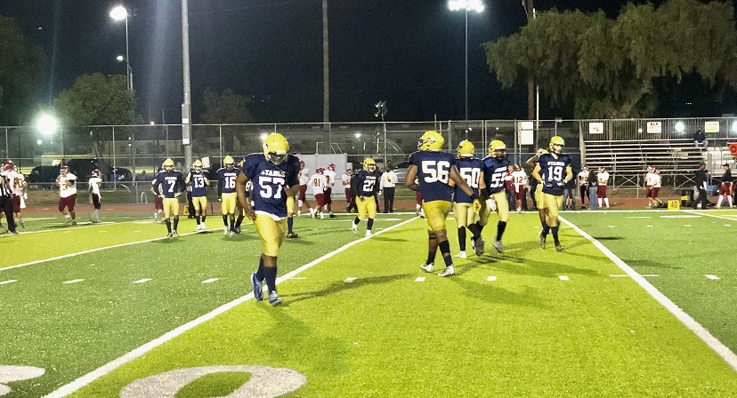 Muir Varsity Football Team defeats Arcadia, 30-0 - Pasadena Schools